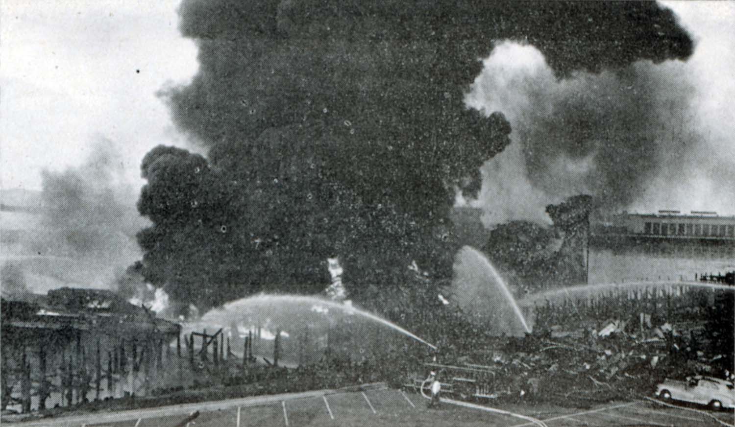 At the Shell Oil Company Dock, where the doomed tanker was burning ...